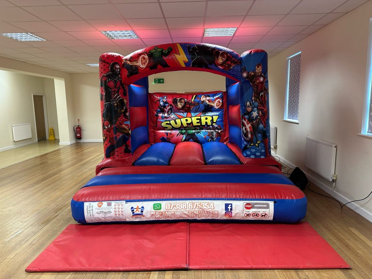 Children’s Superhero Bouncy Castle - Bouncy castle hire | Carol's ...